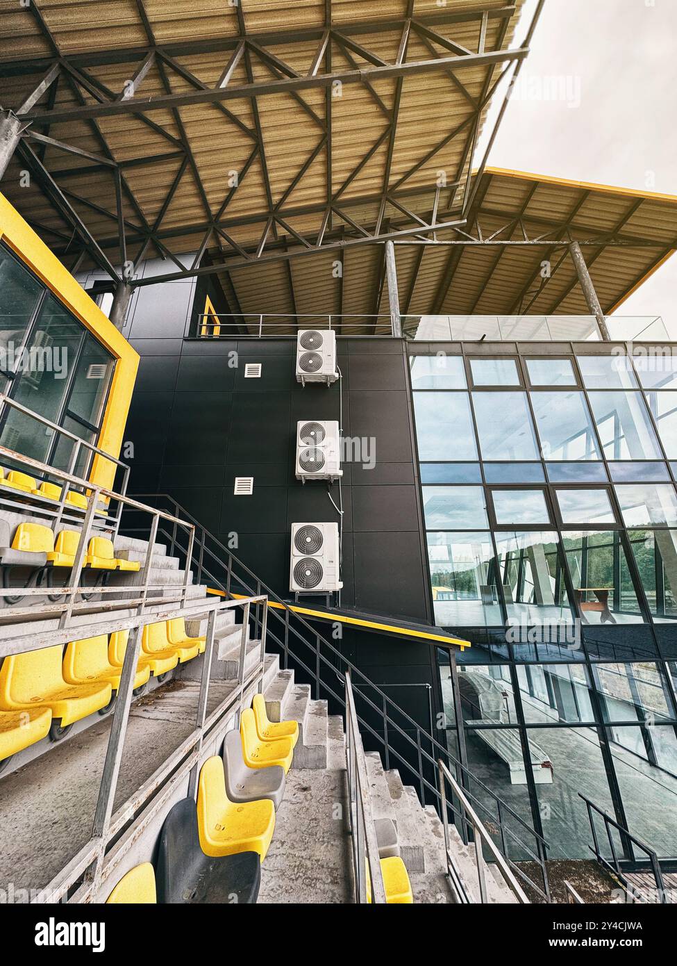 Sports building with air conditioners on the wall Stock Photo - Alamy