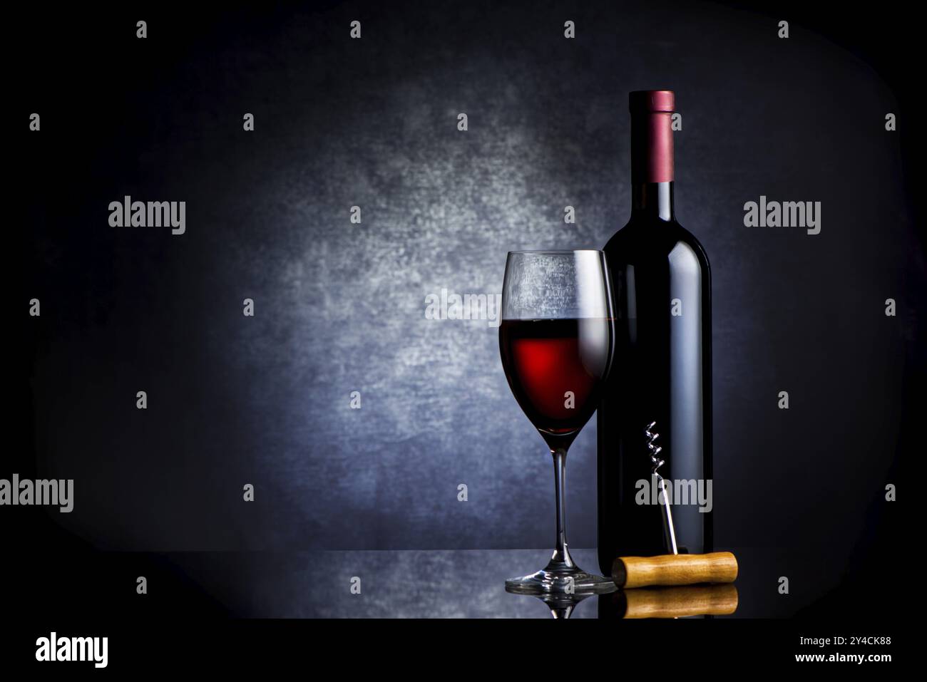 Red wine composition on a black background Stock Photo - Alamy