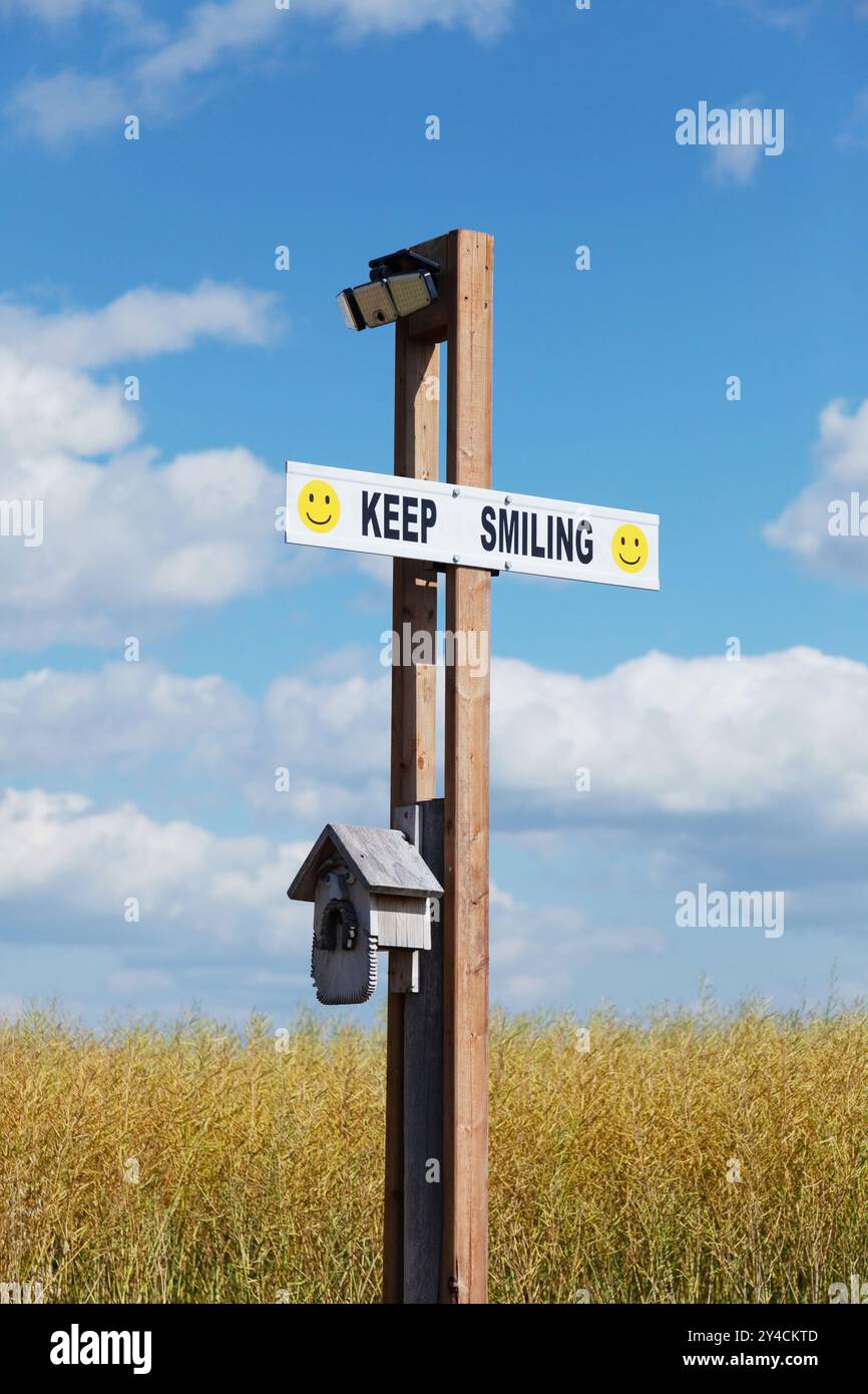 Keep Smiling sign, near Watrous SK Canada Stock Photo - Alamy