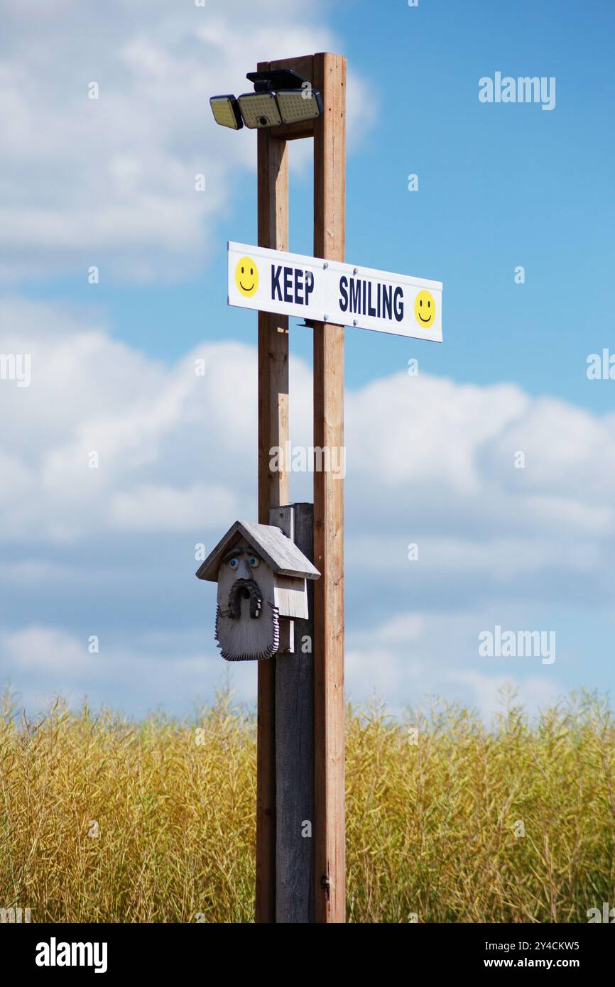 Keep Smiling sign, near Watrous SK Canada Stock Photo - Alamy
