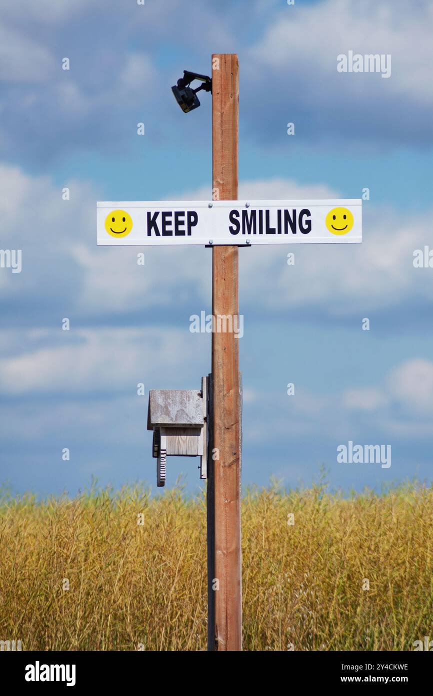 Keep Smiling sign, near Watrous SK Canada Stock Photo - Alamy