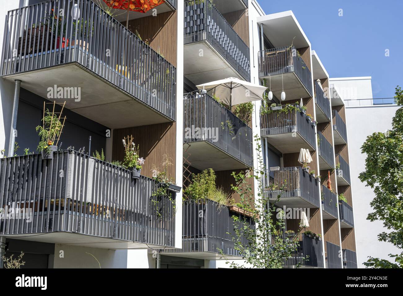 Facade with balconies of a modern apartment block in Berlin, Germany ...