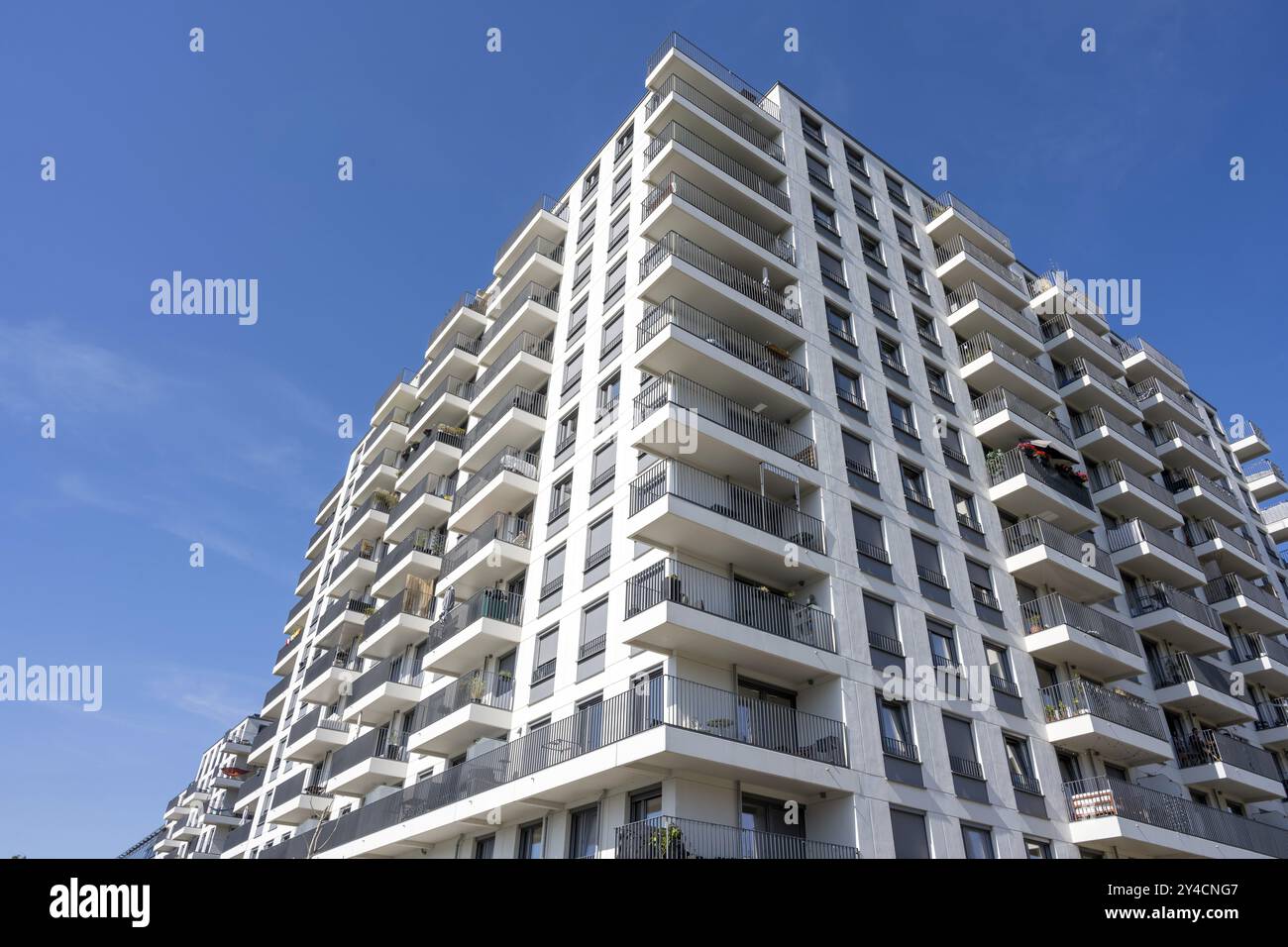 Large white apartment block with balconies in Berlin, Germany, Europe ...