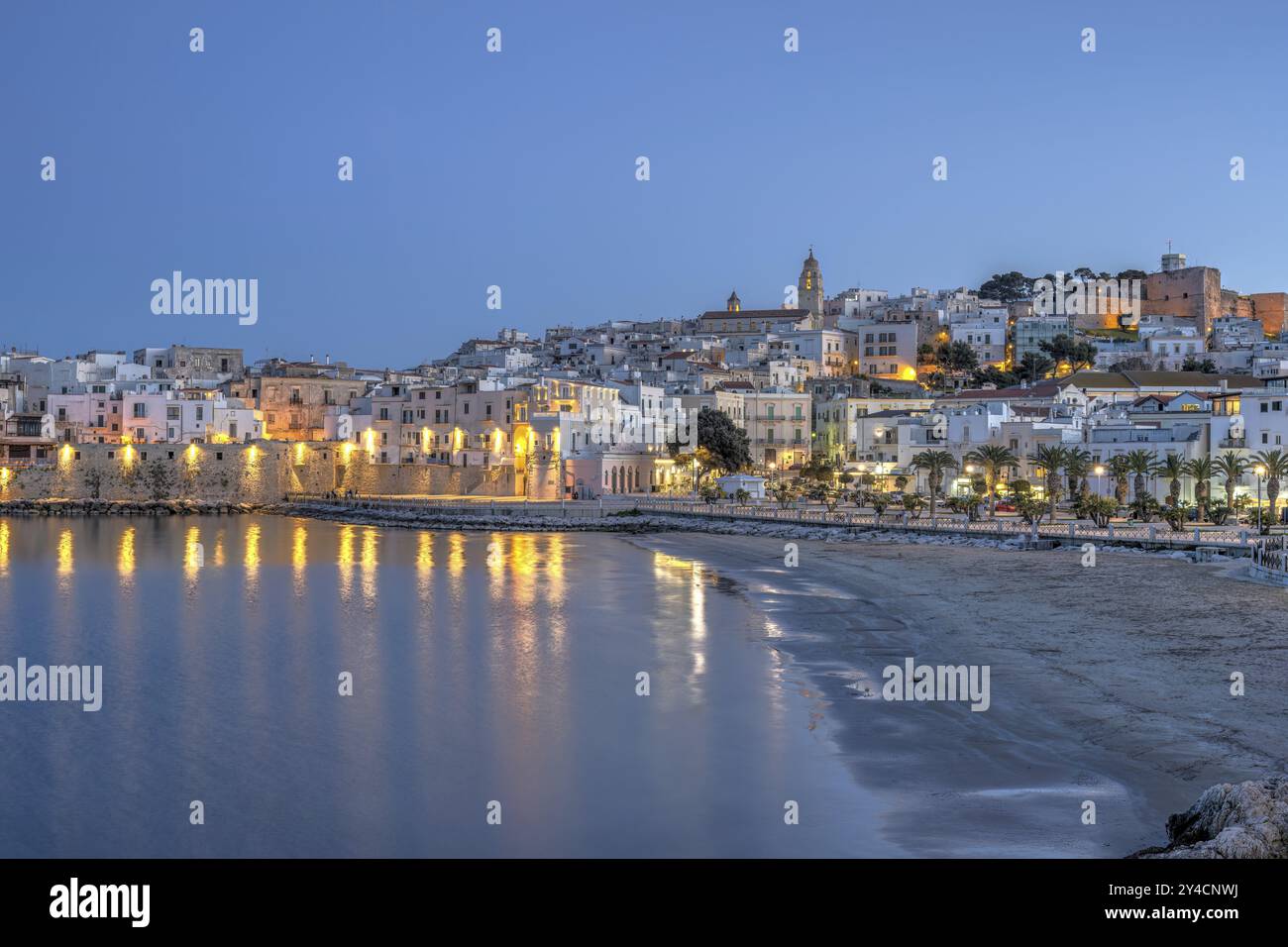The old town centre of Vieste on the Gargano in Apulia, Italy, at dusk ...