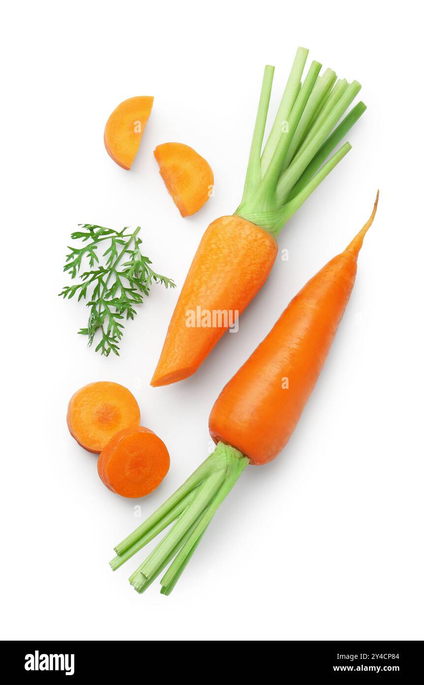 Whole and cut fresh carrots isolated on white, top view Stock Photo - Alamy