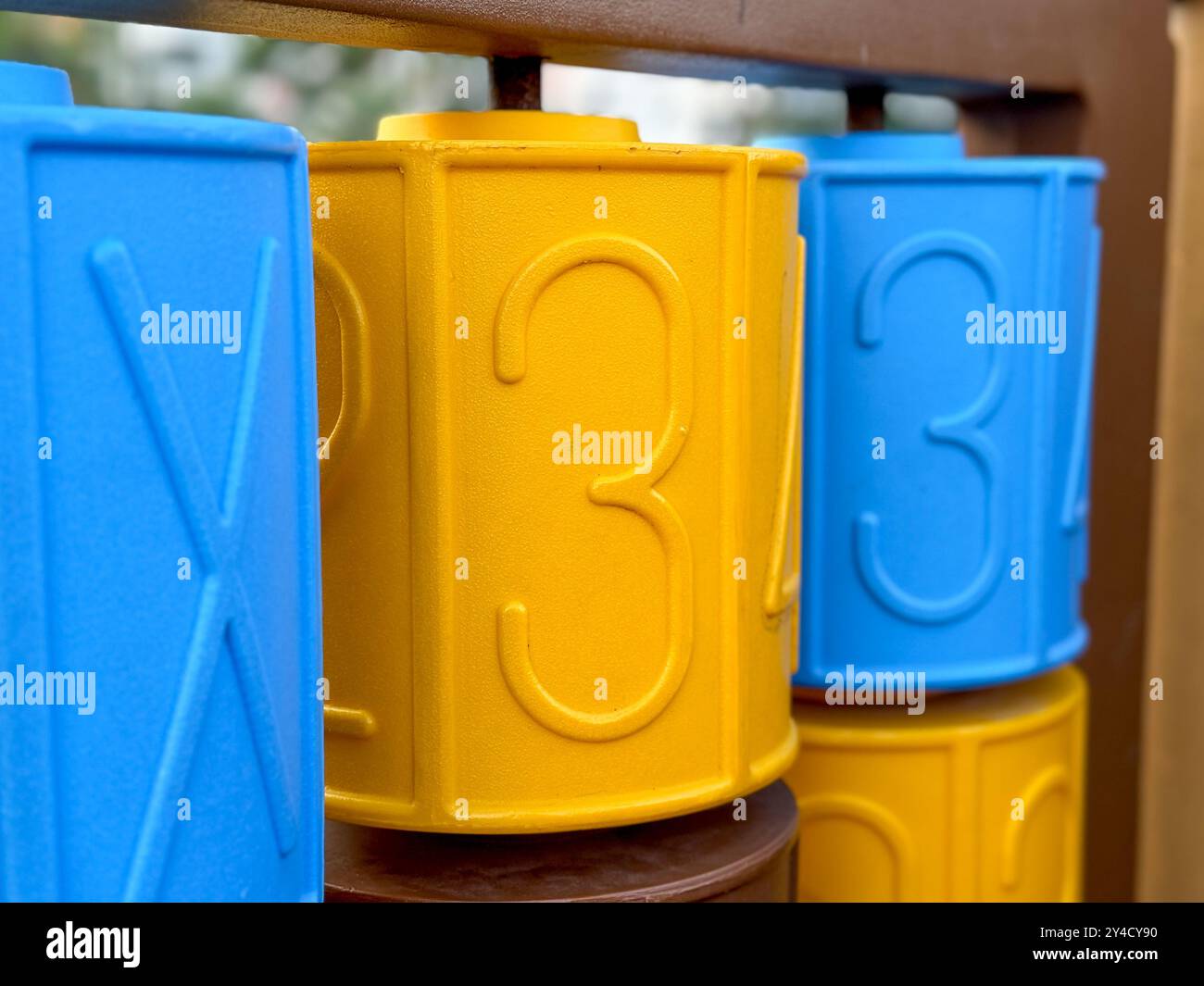 Brightly colored numbers on a play structure at a community park during ...