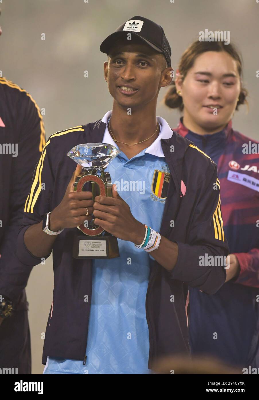 Alison dos Santos of Brazil with his Diamond League Trophy for 2024 at ...