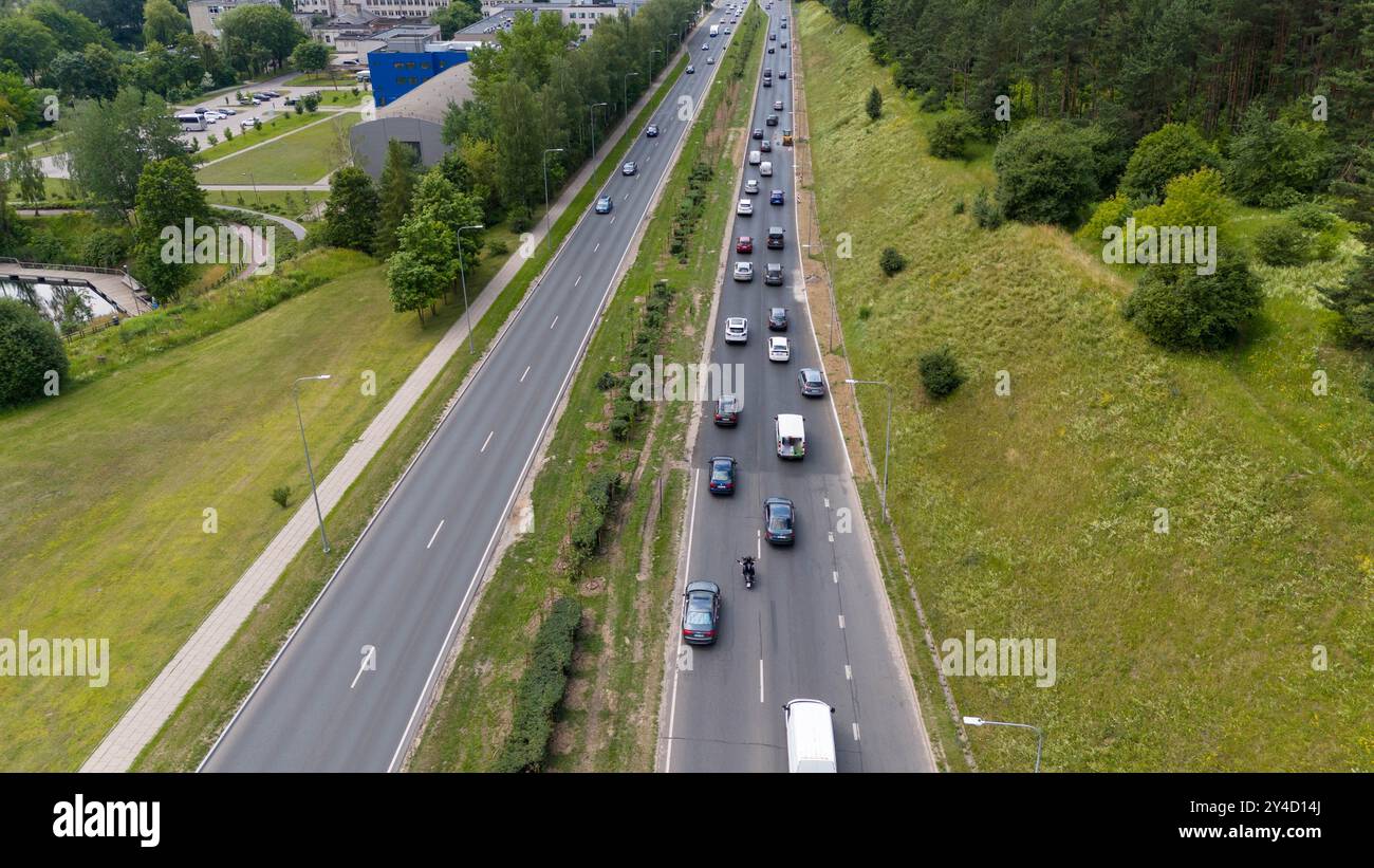 Aerial view of a busy highway with multiple lanes filled with cars ...
