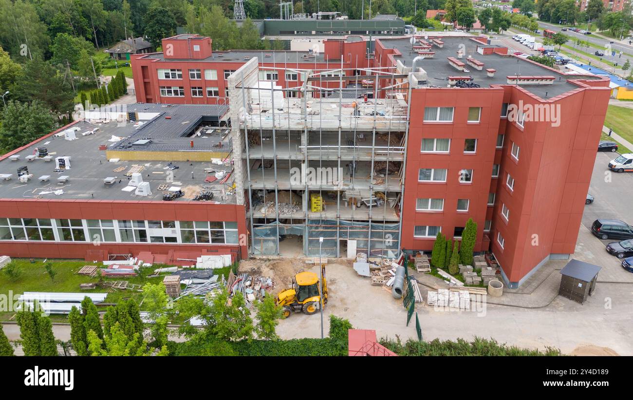 Construction site of a multi-story building with exposed floors and ...