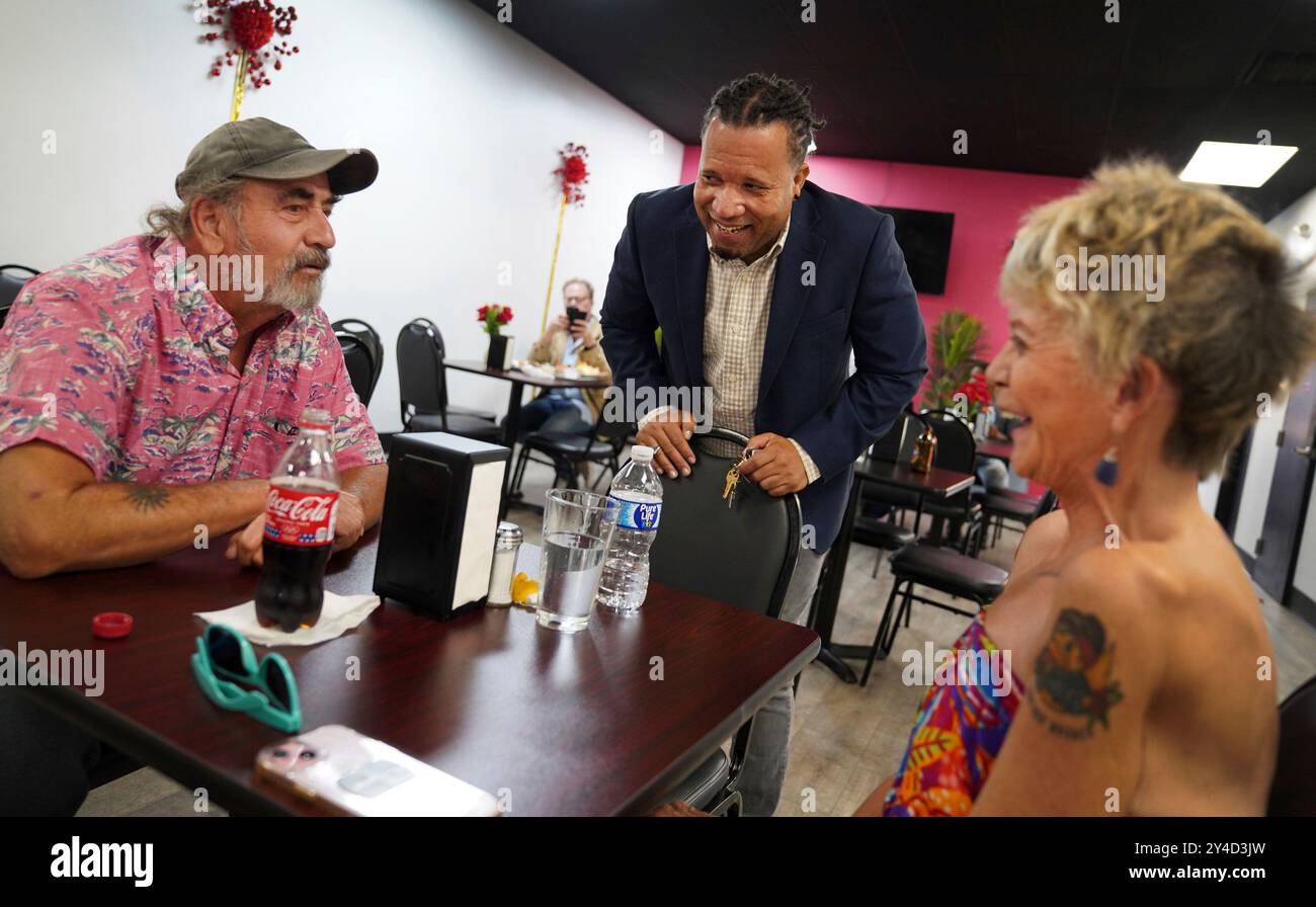 Karl Mattila, left, and his wife Linda, of Medway, Ohio, talk with ...