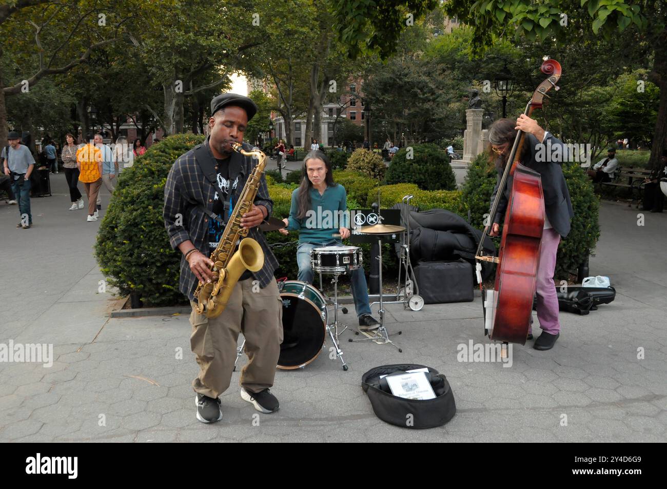 People play music in Washington Square Park in the Greenwich Village ...