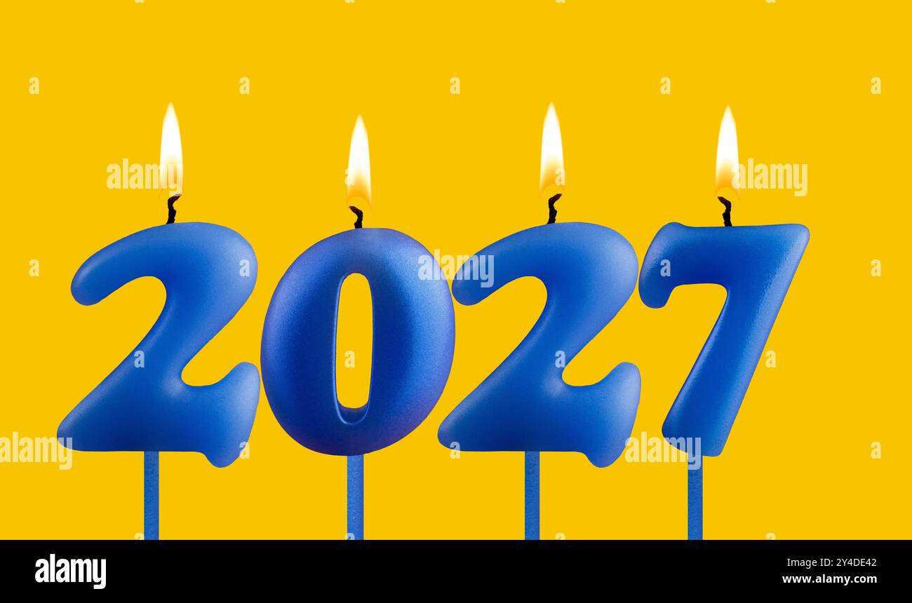 Happy New Year 2027 - Candles in the form of lit numbers Stock Photo ...