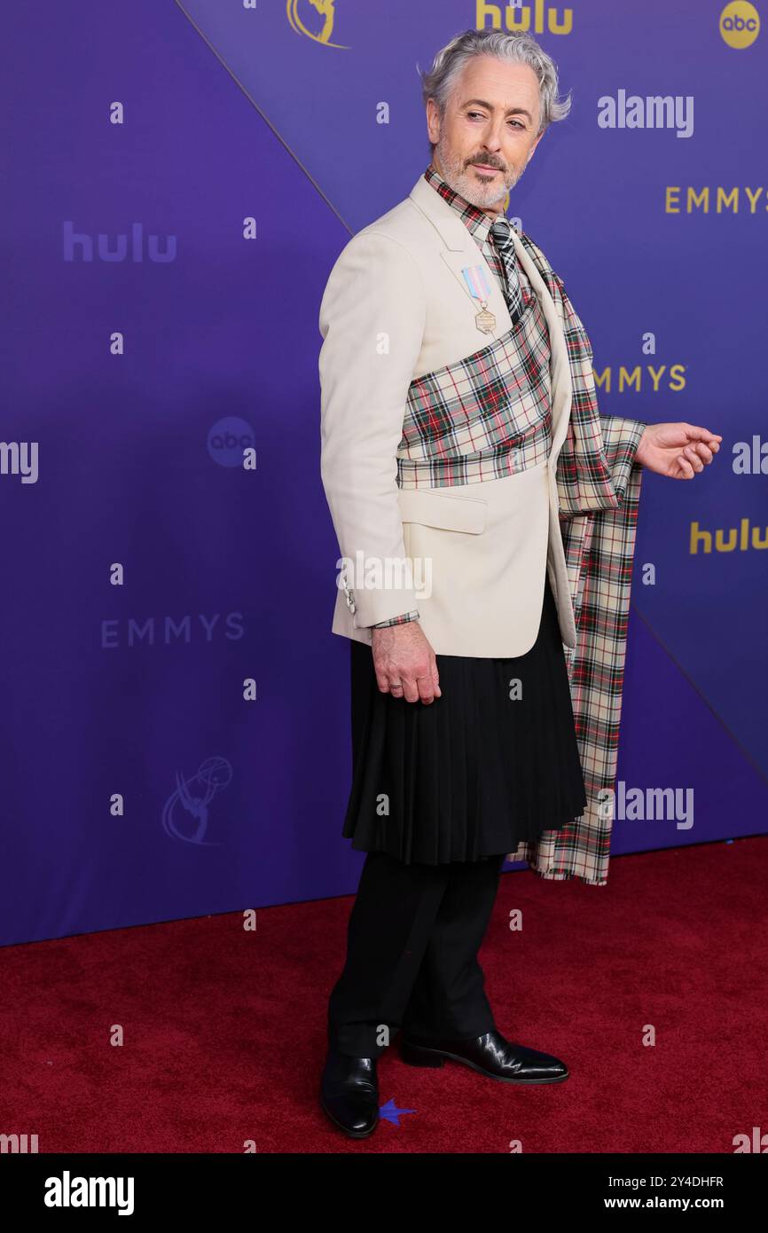 Alan Cumming poses for a Red Carpet portrait at the 76th Emmy Awards on ...