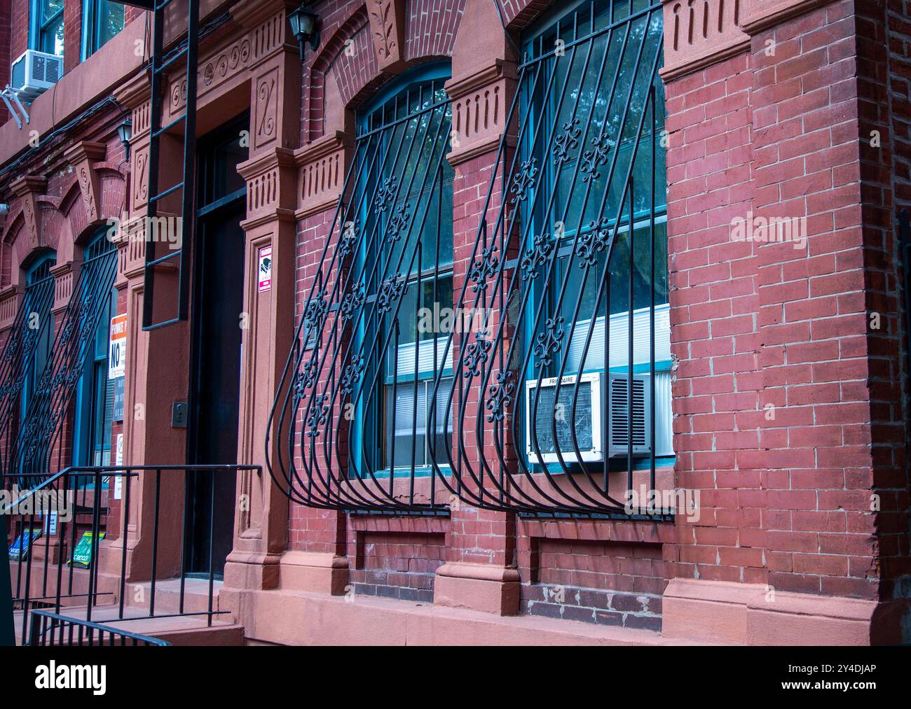 Security bars on a brownstone window in the Clinton Hill area of ...