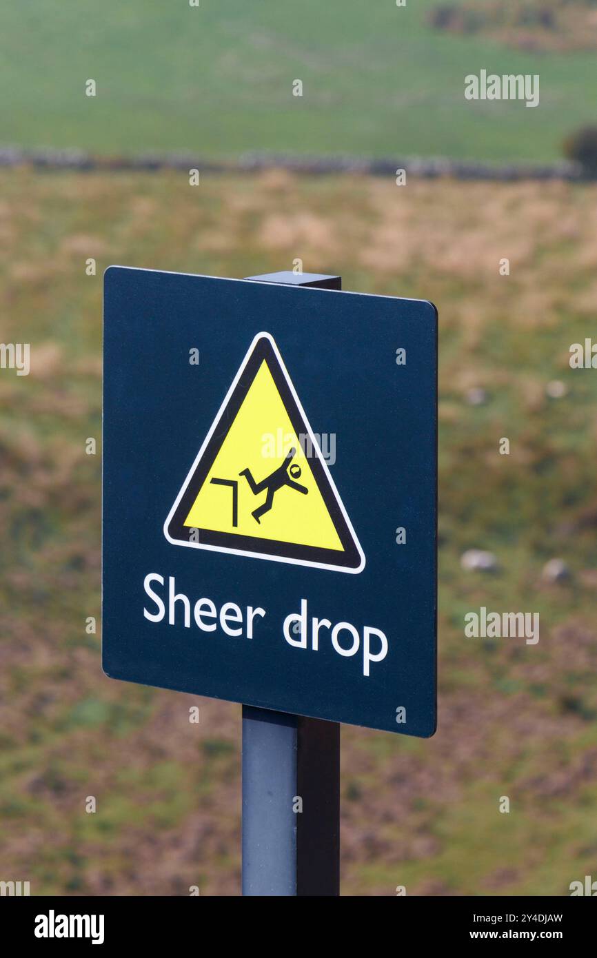sign warning of sheer drop danger of falling outside dunstanburgh ...