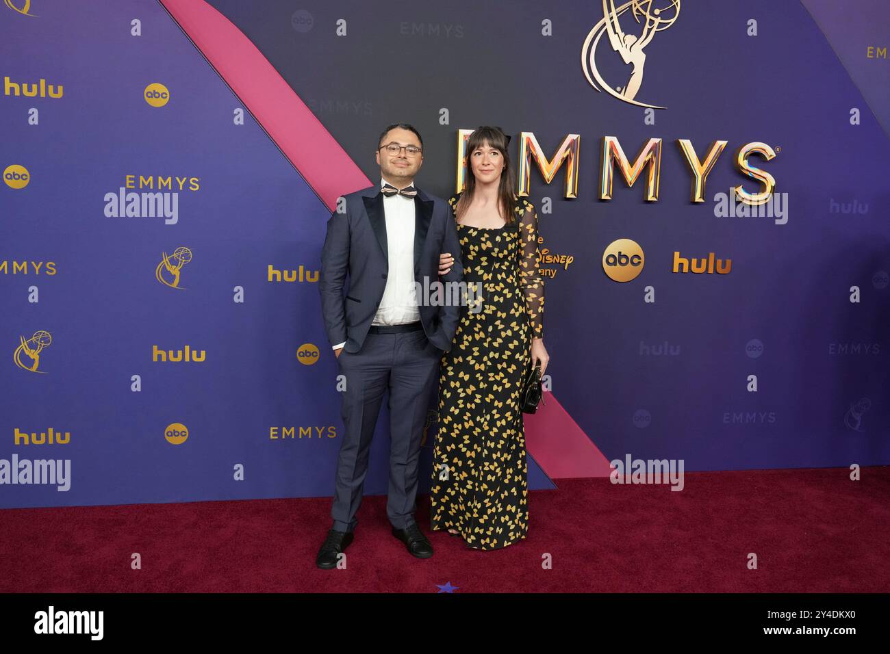 Joe Mande and Kylie Augustine pose for a Red Carpet portrait at the ...