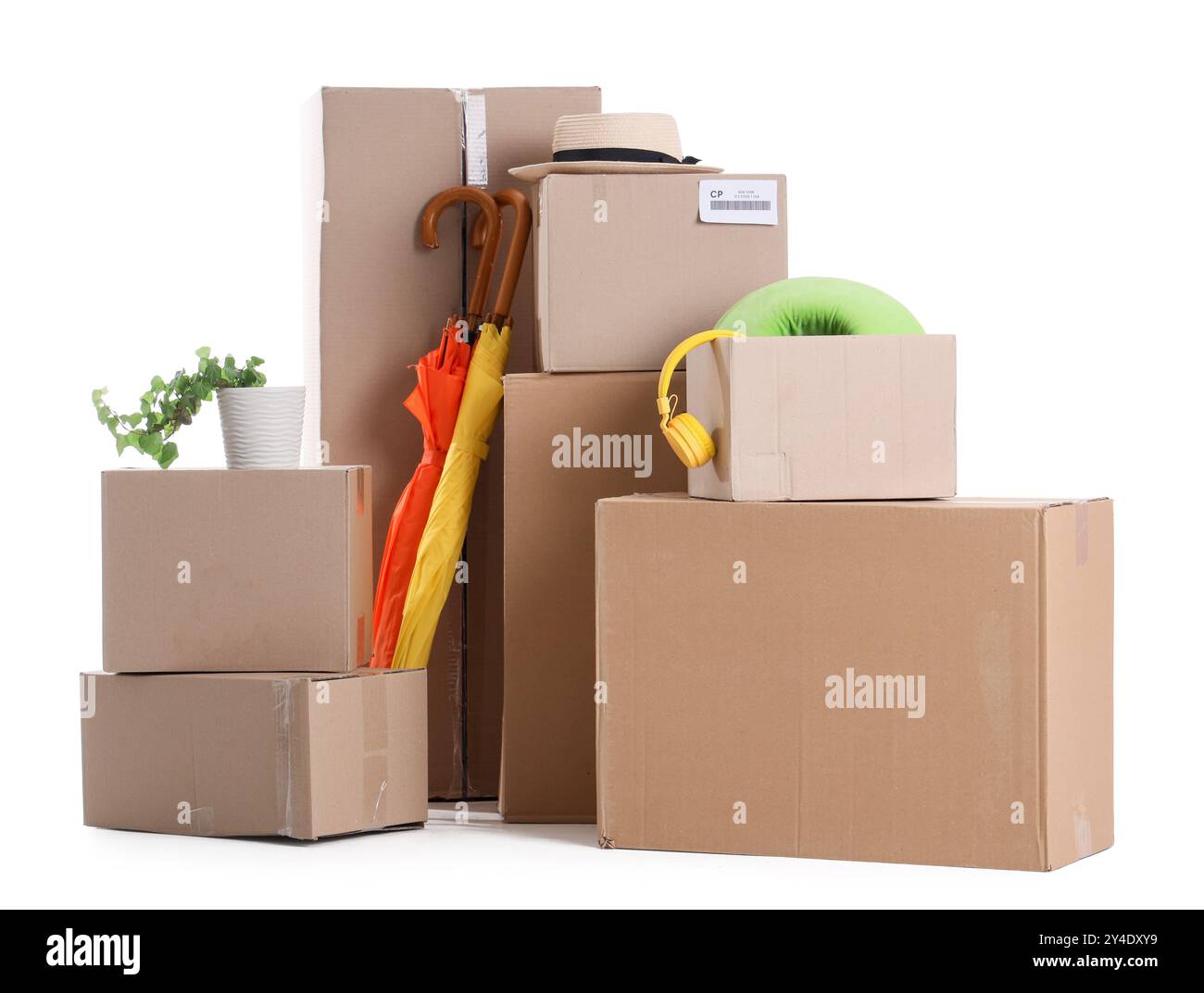 Cardboard boxes with things on white background Stock Photo - Alamy