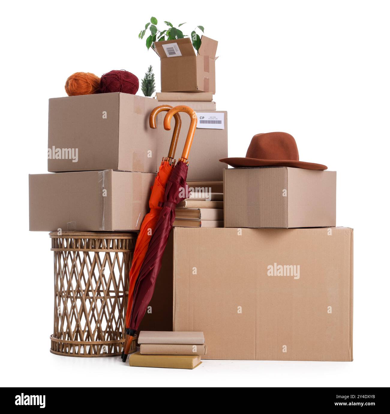 Cardboard boxes with things on white background Stock Photo - Alamy
