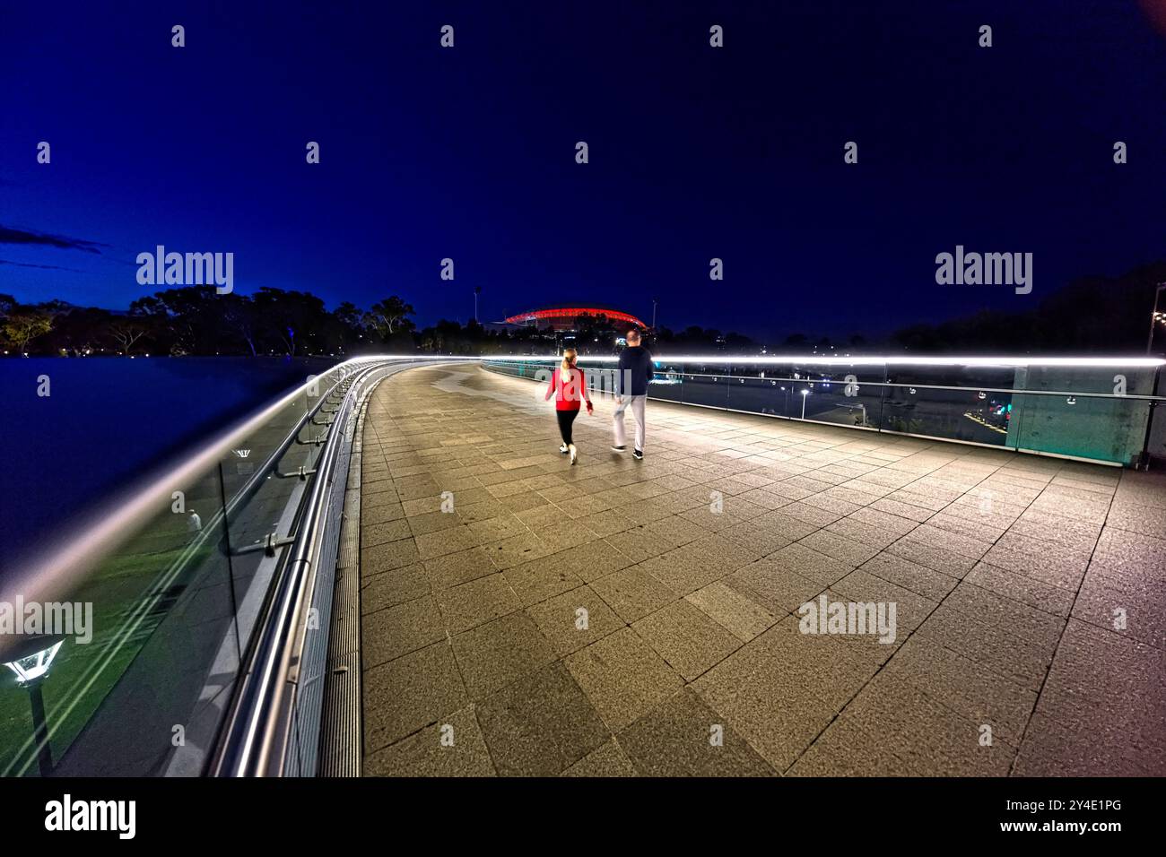 Riverbank bridge at night with lights of the Adelaide oval, Adelaide ...