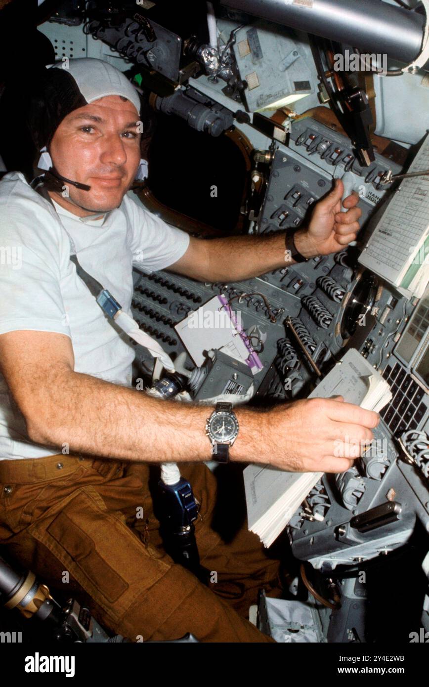 Command Module Pilot Vance D. Brand at the controls of the Apollo Command Module during the ...