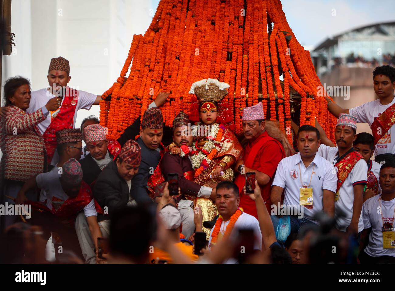 Kathmandu, Nepal. 17th Sep, 2024. Living Goddess Kumari is carried for ...