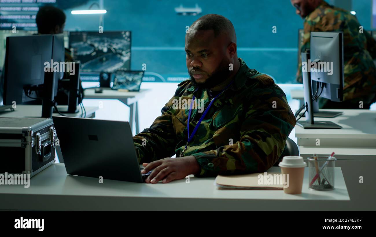 Intelligence agents in modern operations center managing surveillance ...