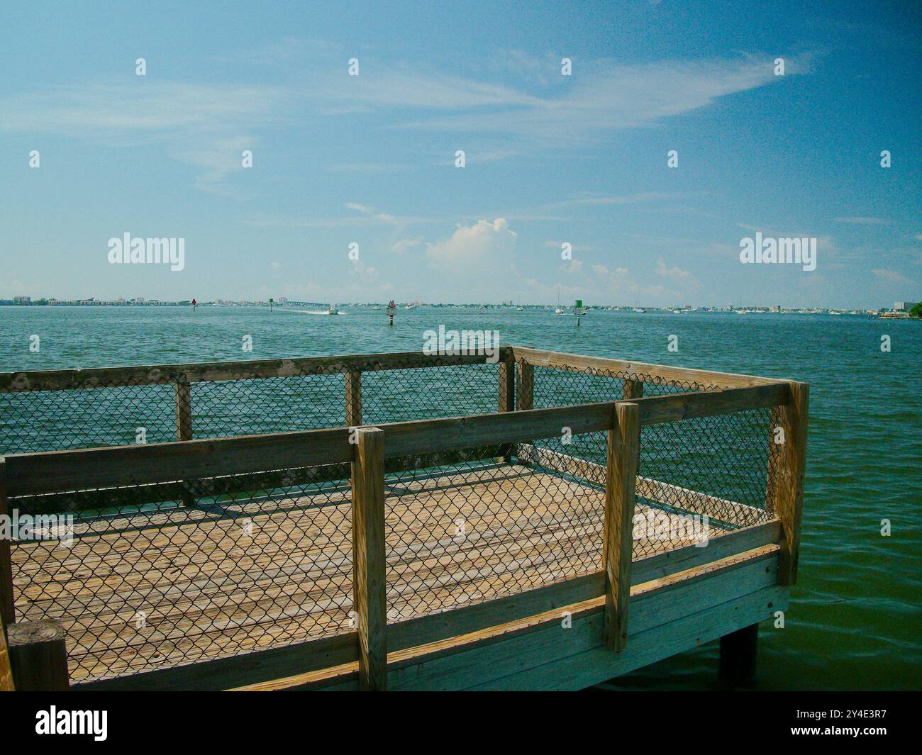 Wide View out over the wood boardwalk pier over Boca Ciega Bay in ...
