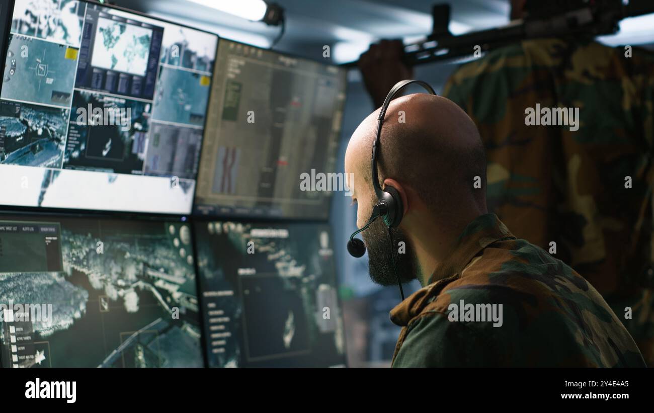 Army telecommunication systems operator using radio and satellite ...