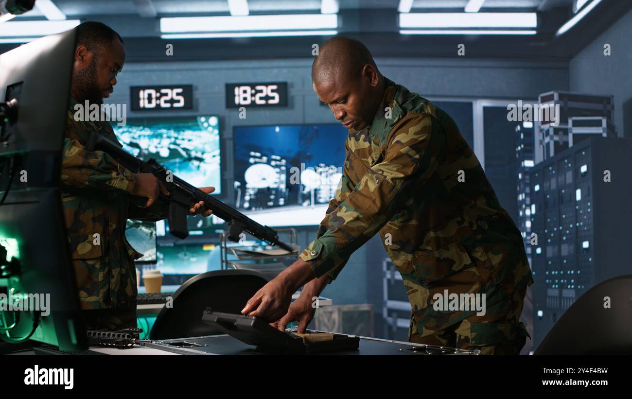 Military officers working together to check guns in command post ...