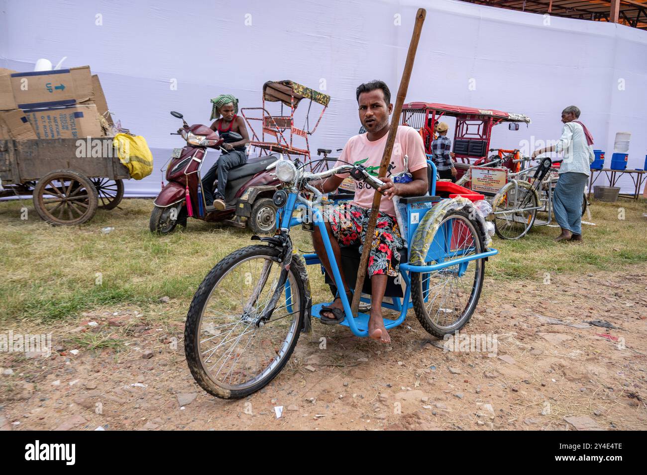 A disabled man rides his new Battery Operated Handicapped Tricycle ...