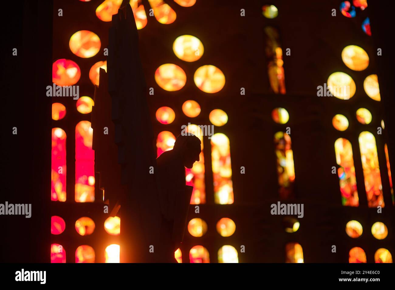 Interior of the church angel sculpture stained windows Stock Photo - Alamy