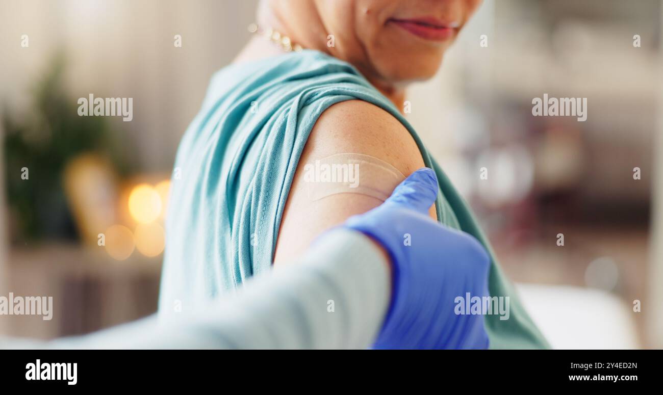 Bandage, patient and arm of woman with healthcare and immune system ...