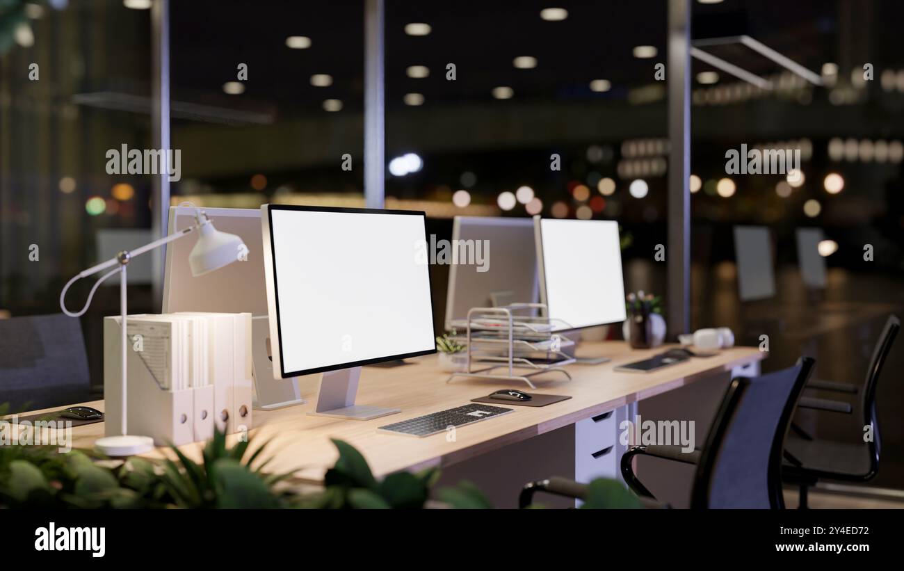 A close-up of computer desks in a modern office on a skyscraper at ...