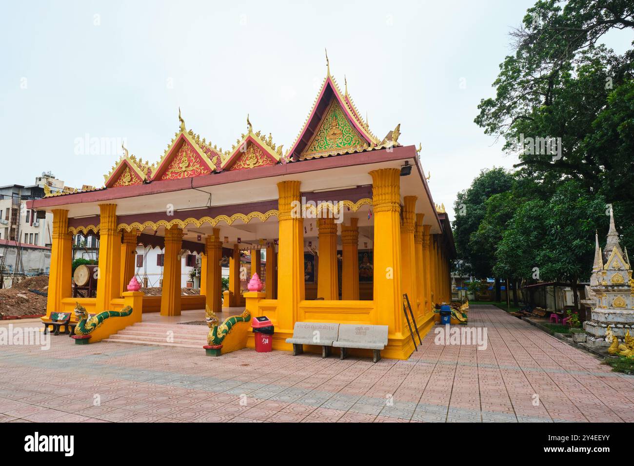 The modest front entrance to the orange main building at Buddhist ...