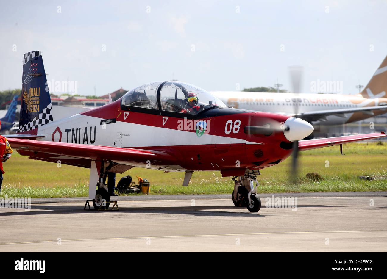 A pilot in the Indonesia Air Force Jupiter aerobatic team prepares to ...