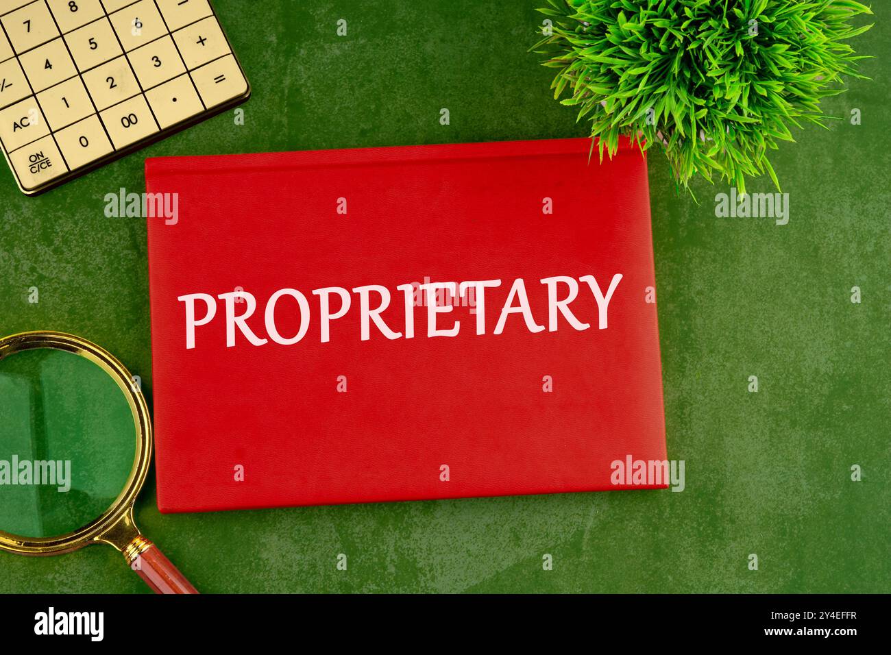 Letters of the alphabet with words PROPRIETARY on the red book ...