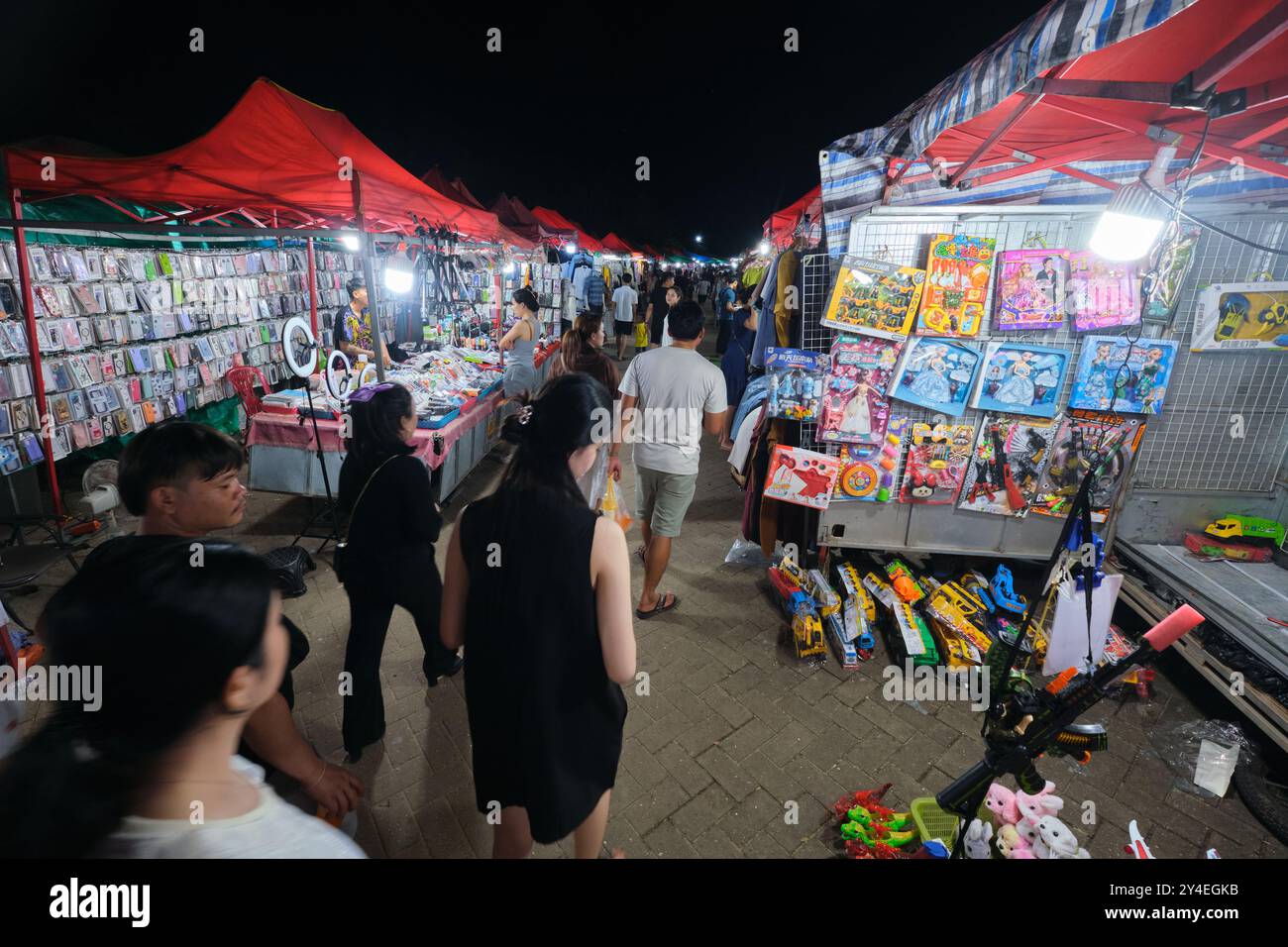Shopping at the pop up, local, poor, Mekong riverside night market. In ...