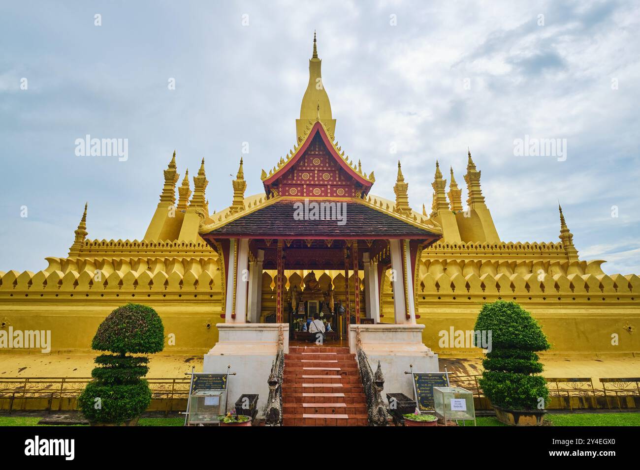 A view of the famous, landmark, gold stupa on a cloudy, grey, moody ...