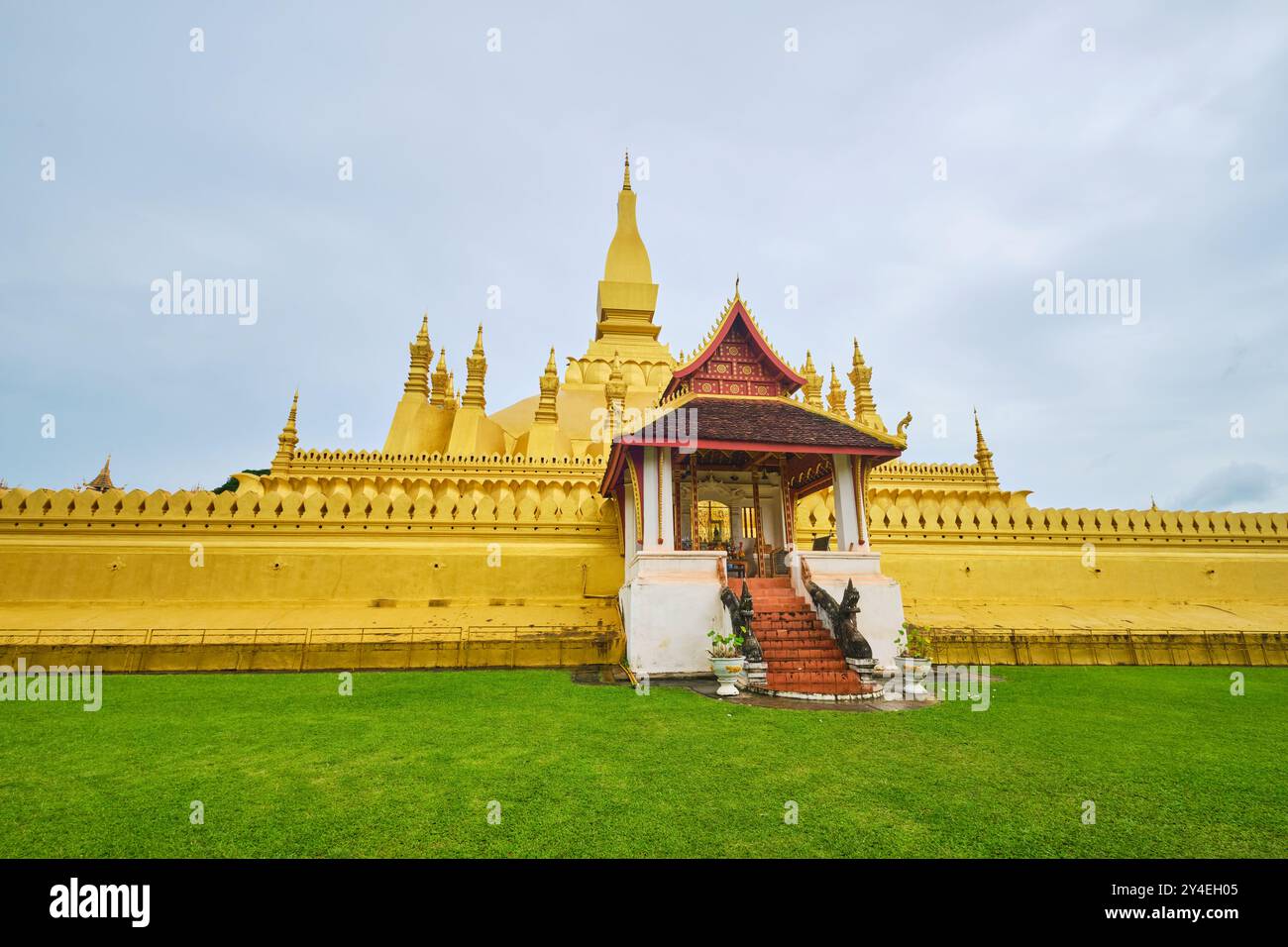 A view of the famous, landmark, gold stupa on a cloudy, grey, moody ...