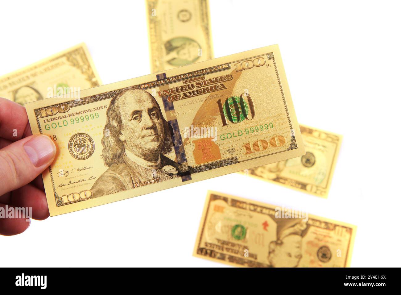 golden dollars banknotes isolated on the white background Stock Photo ...