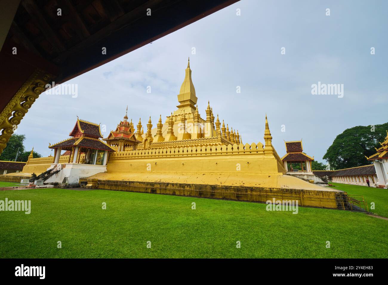 A view of the famous, landmark, gold stupa on a cloudy, grey, moody ...