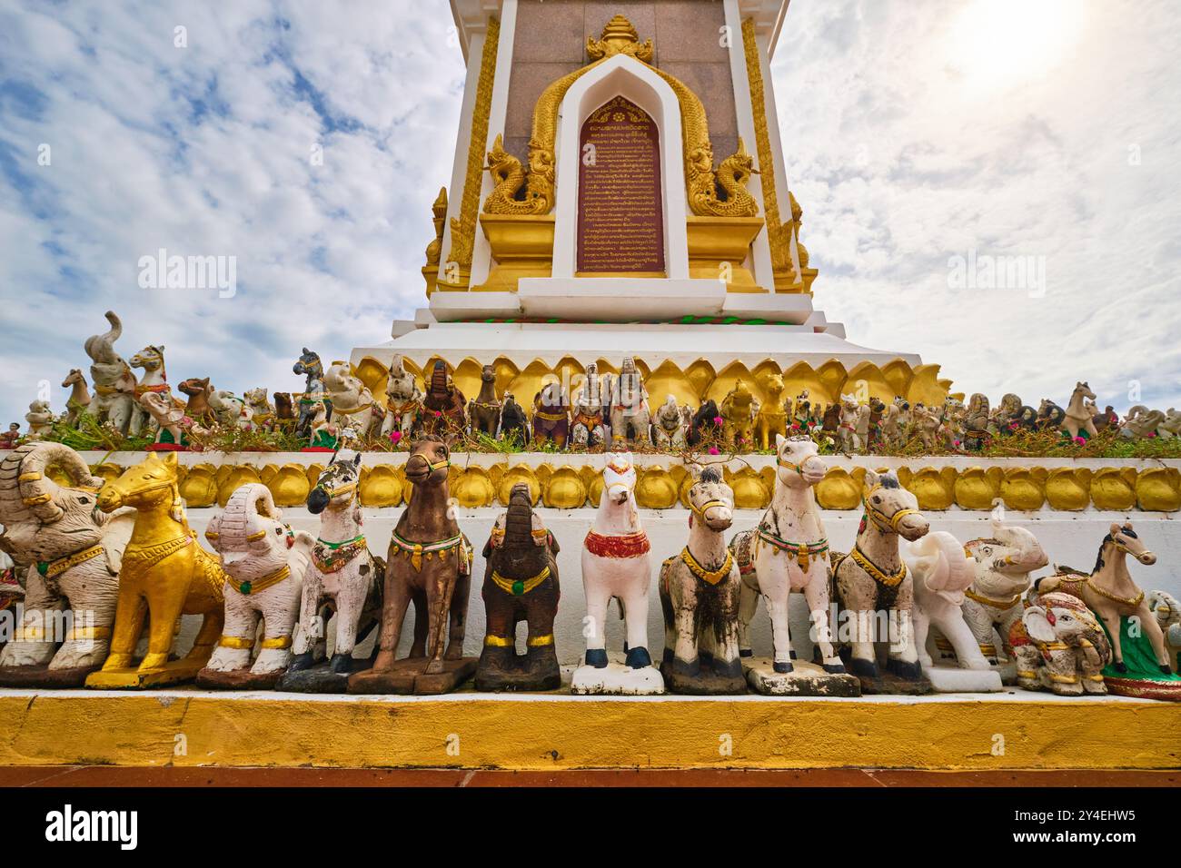 Detail of many of the gold and white horse and elephant relics, icons ...