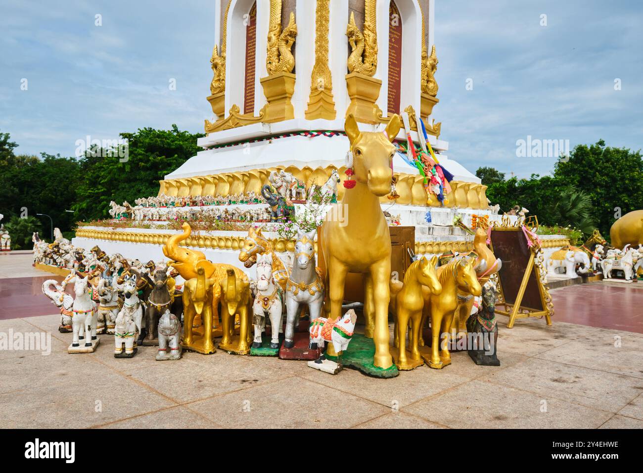 Detail of many of the gold and white horse and elephant relics, icons ...