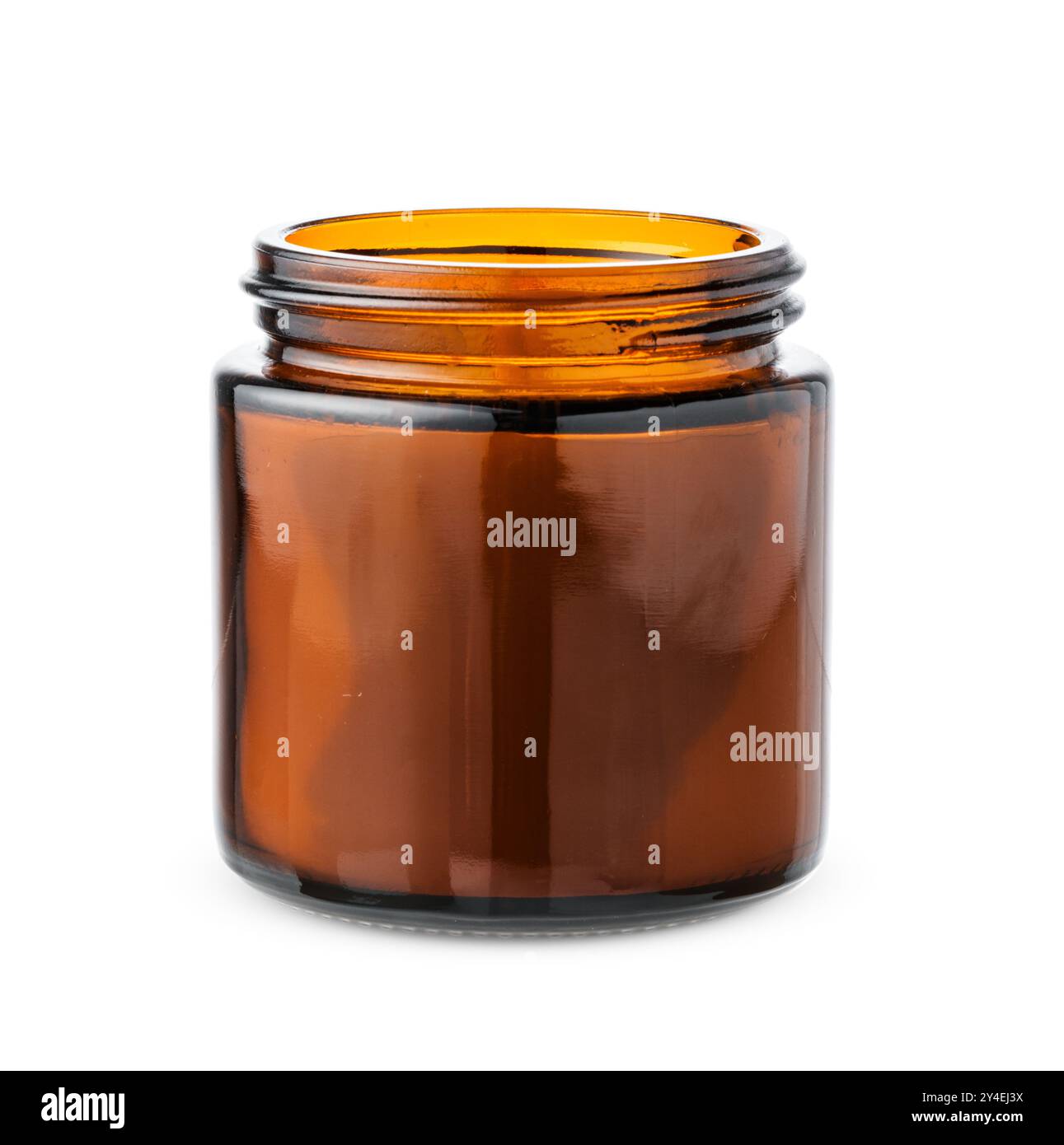 Dark glass jar with candle on a plain white background Stock Photo - Alamy