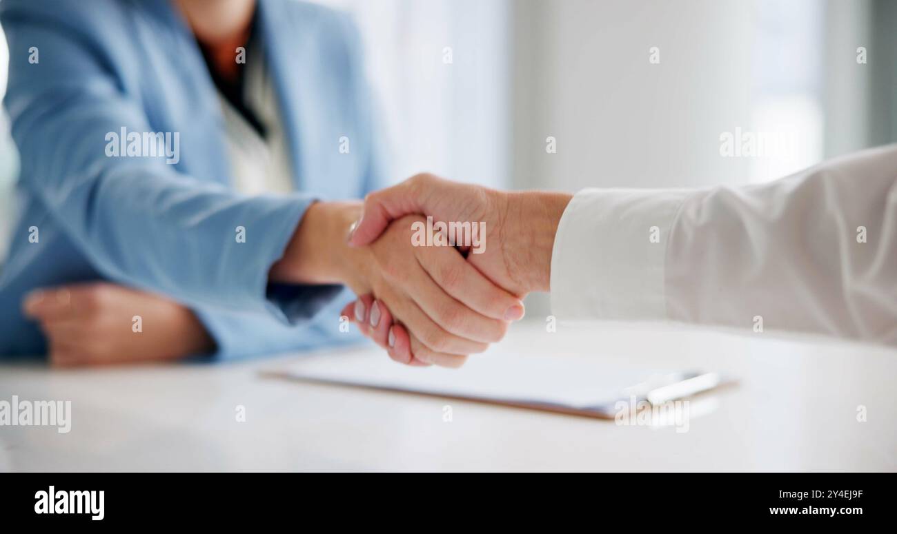 Employees, handshake and contract offer in workplace, hiring and ...