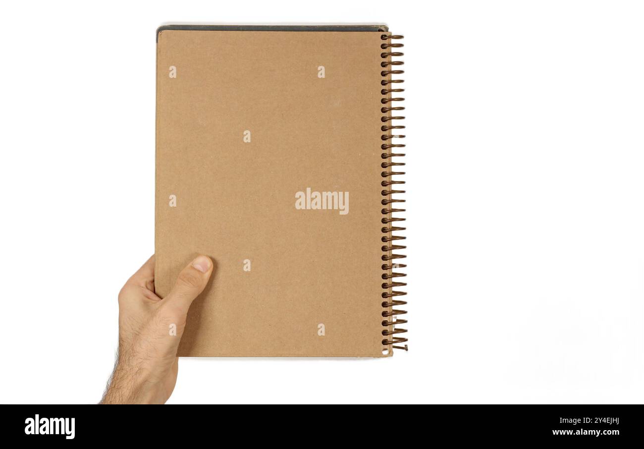 Notebook held by a man isolated on white background Stock Photo - Alamy