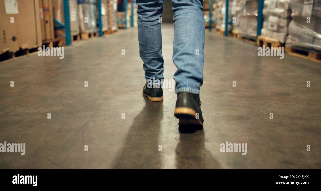 Person, legs and walking at warehouse for logistics distribution ...