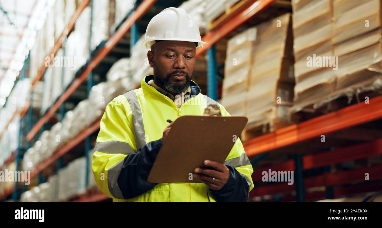 Black man, supervisor and clipboard at warehouse with counting or ...