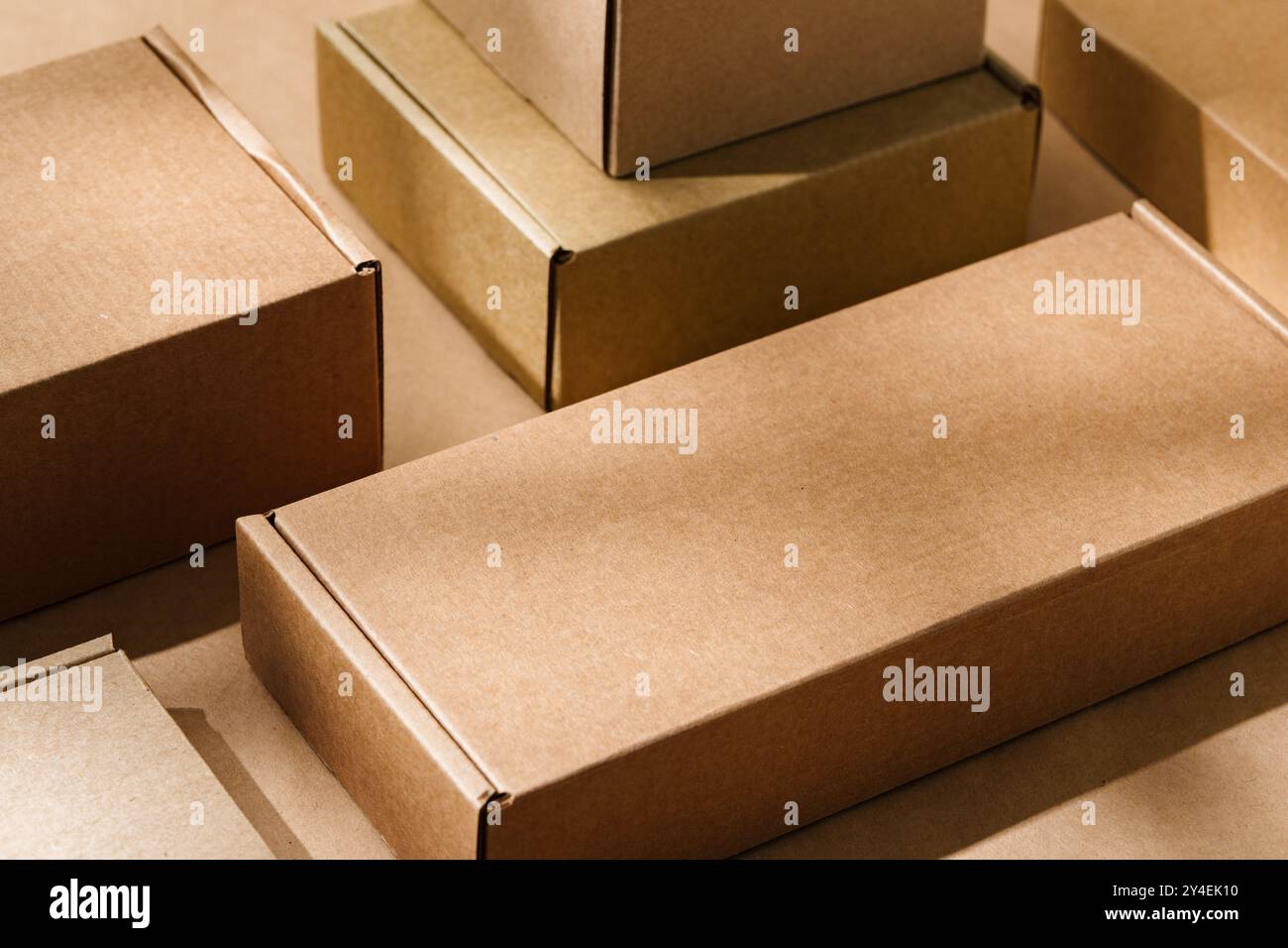 Multiple cardboard boxes arranged on a surface for packaging and ...