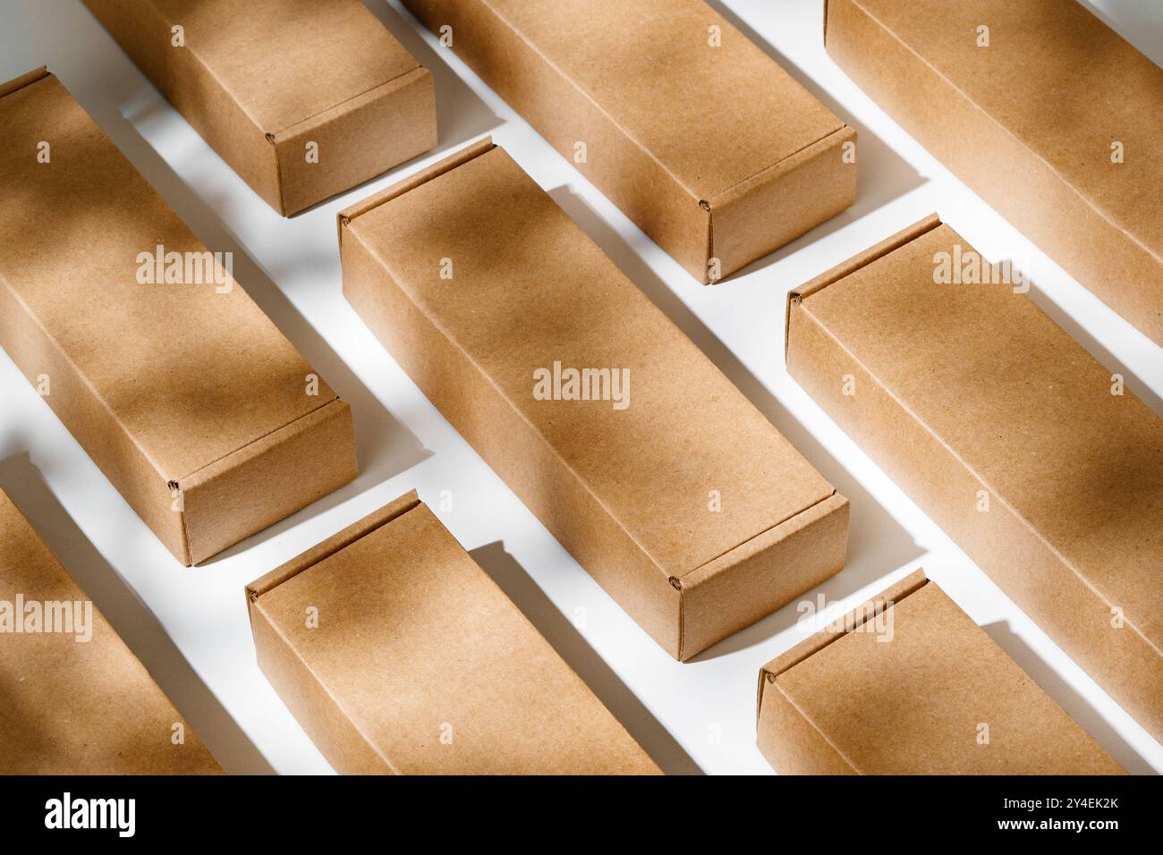 Brown cardboard boxes arranged neatly on a workspace, showcasing ...